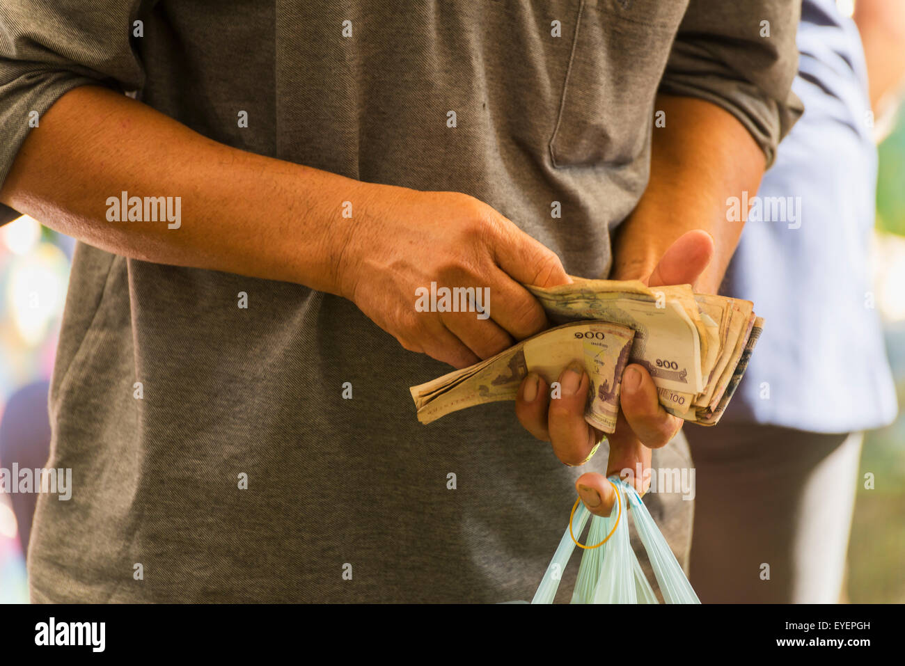 Old person counting money hi-res stock photography and images - Alamy