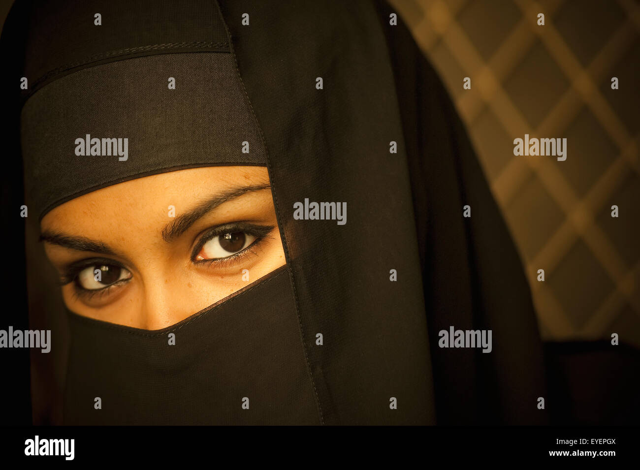Young woman wearing burka black hi-res stock photography and images - Alamy