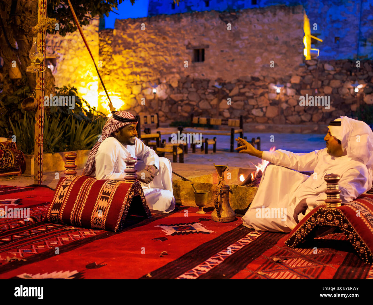 Men sitting, relaxing and talking; Abha, Saudi Arabia Stock Photo - Alamy