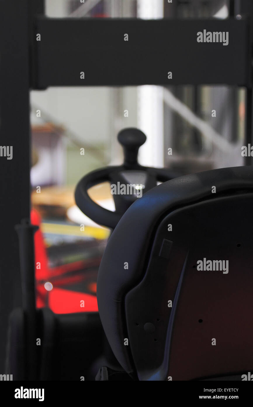 Empty driver seat in a forklift truck Stock Photo - Alamy