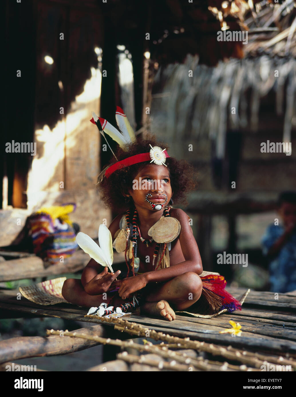 Young Trobriand Island girl in traditional dress; Trobriand Islands ...