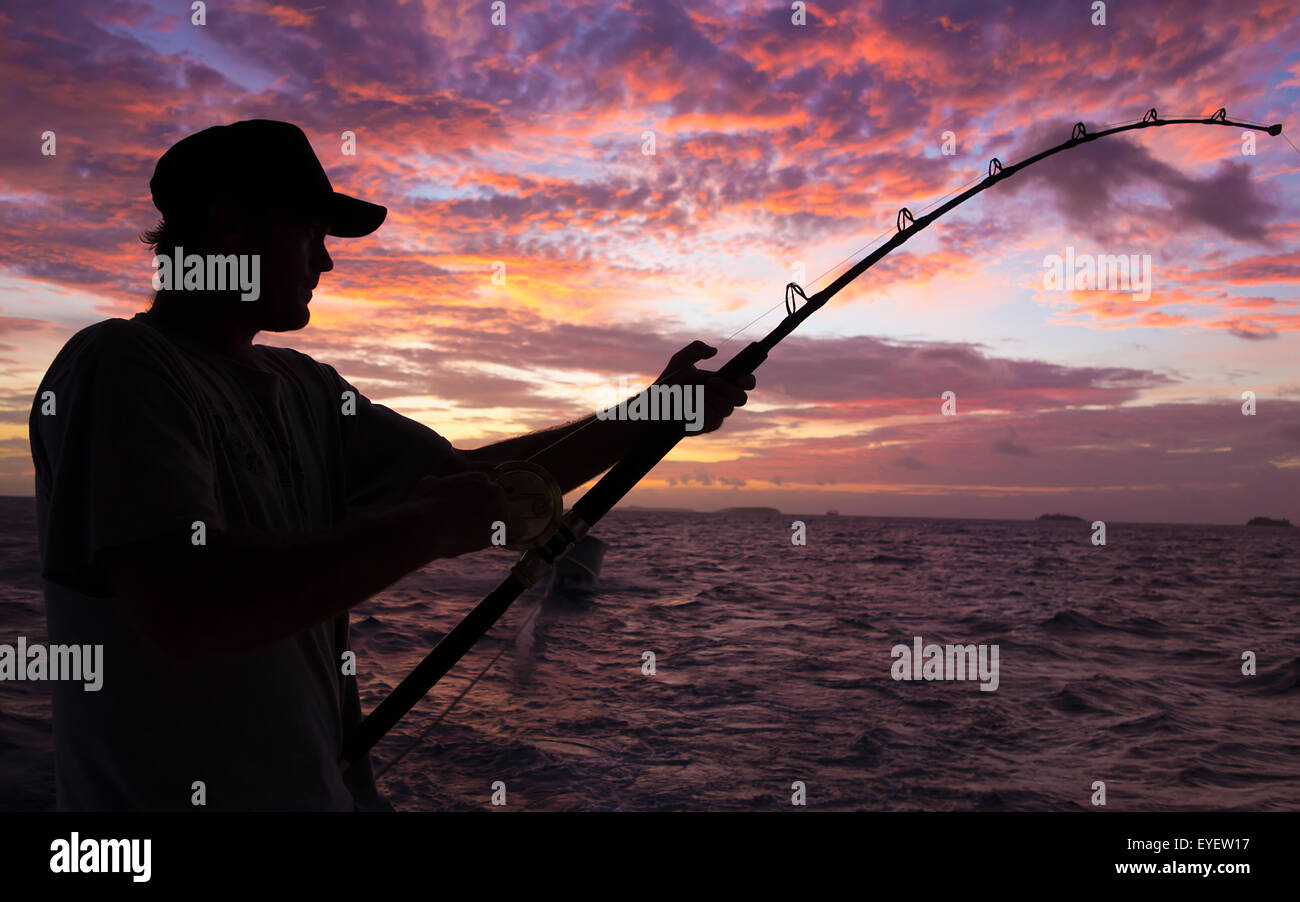 Fishing at sunset; Marshall Islands Stock Photo - Alamy