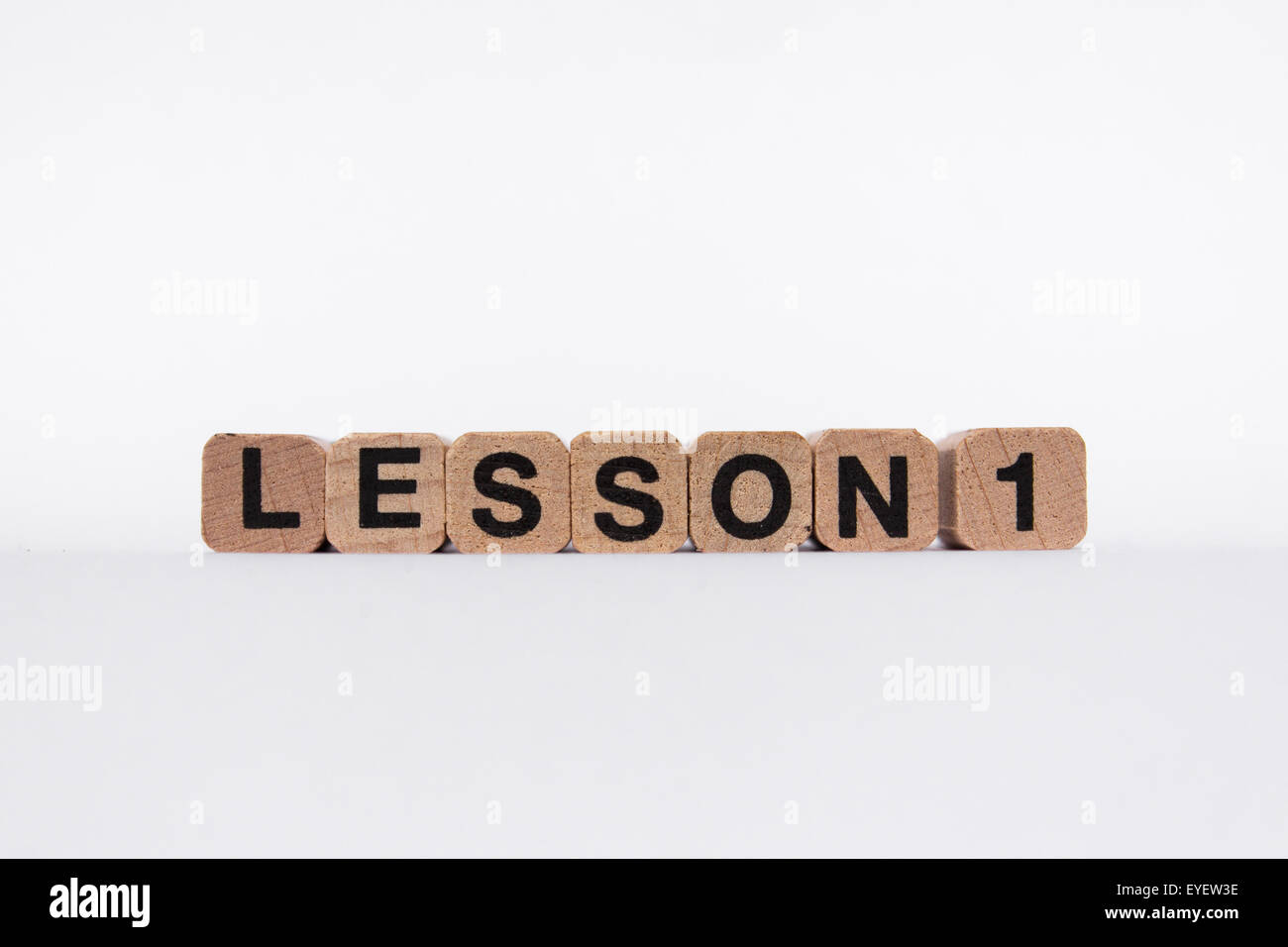 lesson one text on white background Stock Photo - Alamy