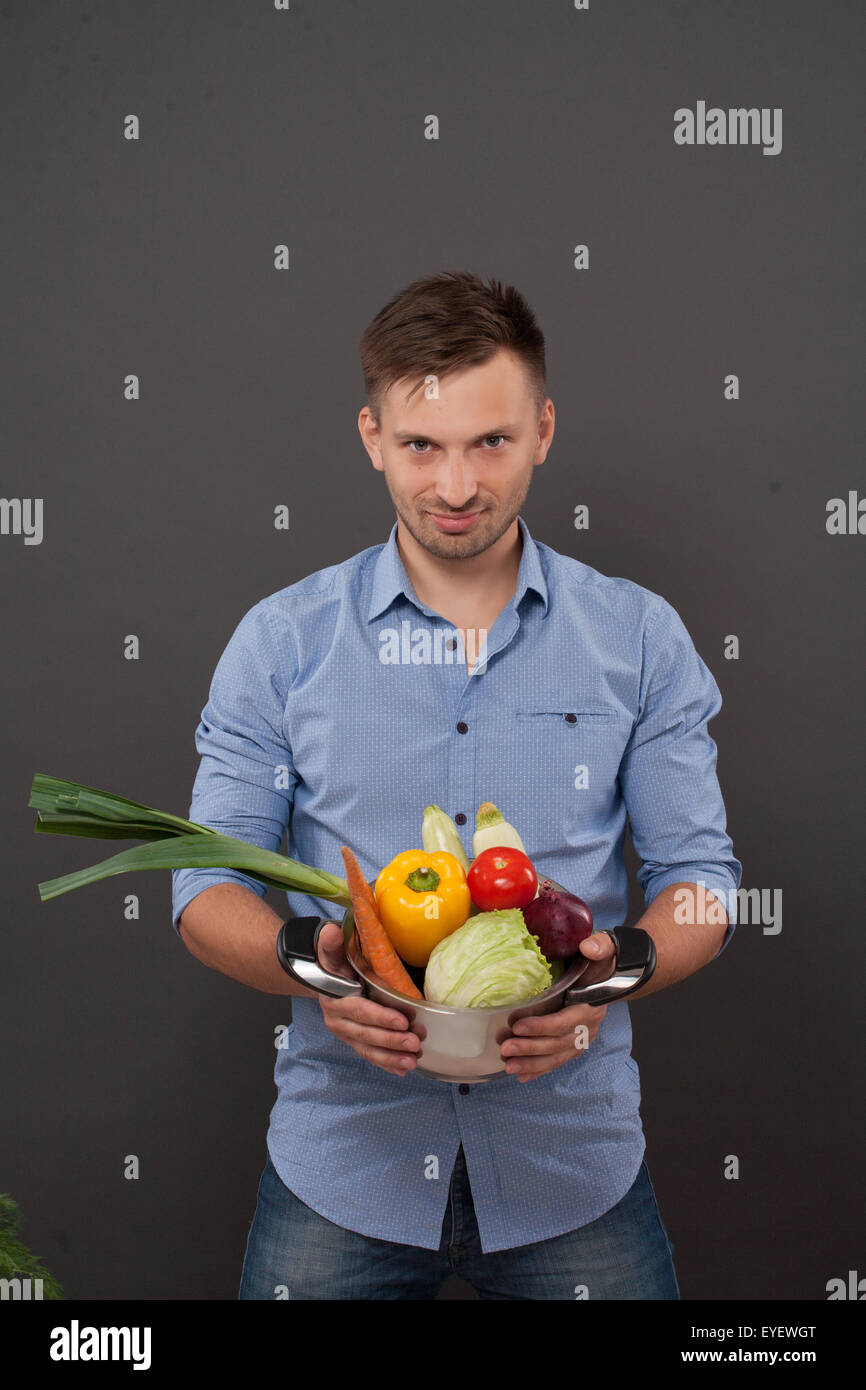 Handsome chef cooking hi-res stock photography and images - Alamy