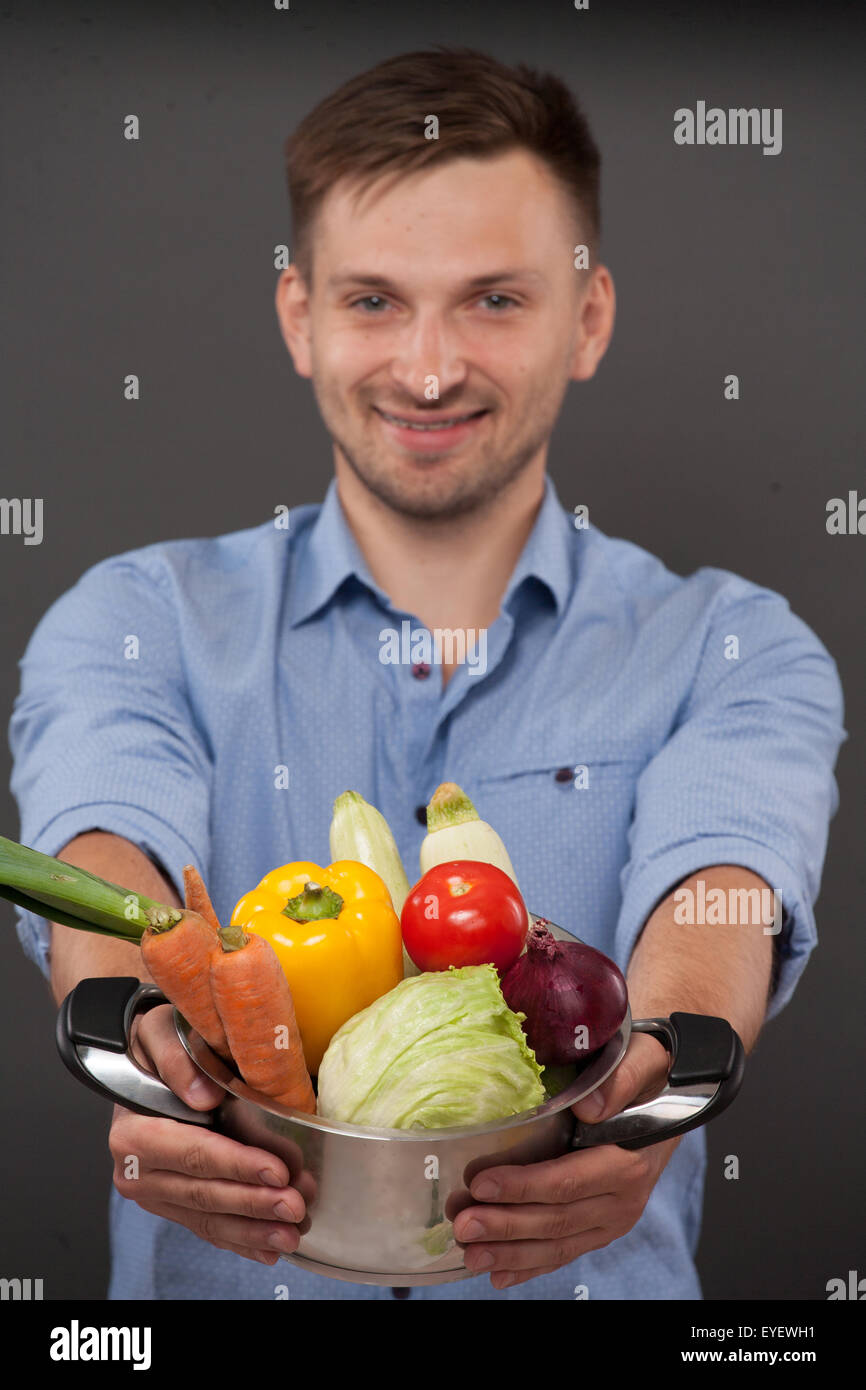 Handsome chef cooking hi-res stock photography and images - Alamy