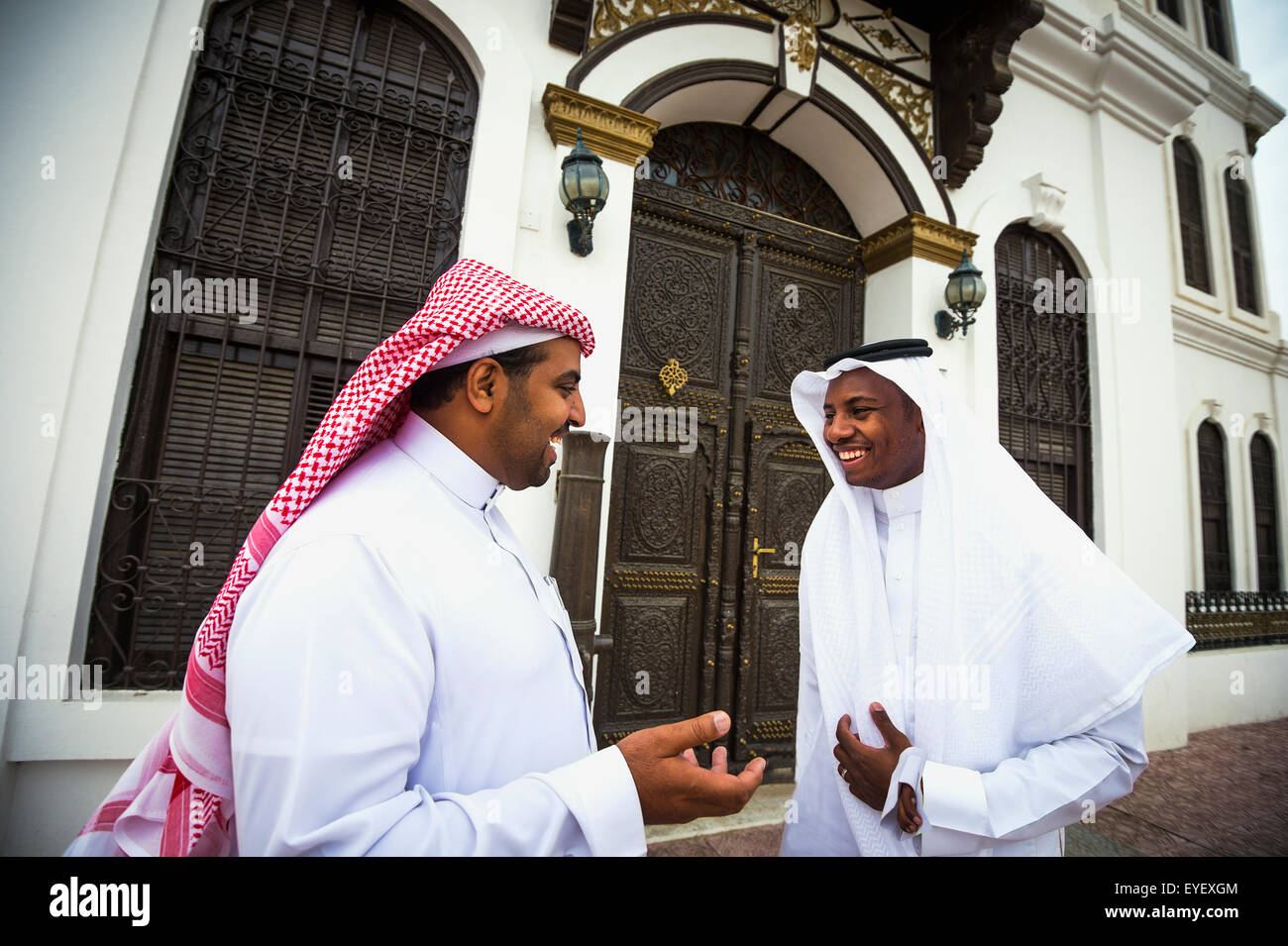 Two Saudis standing in a doorway of Palace of Shubra; Taif, Saudi ...