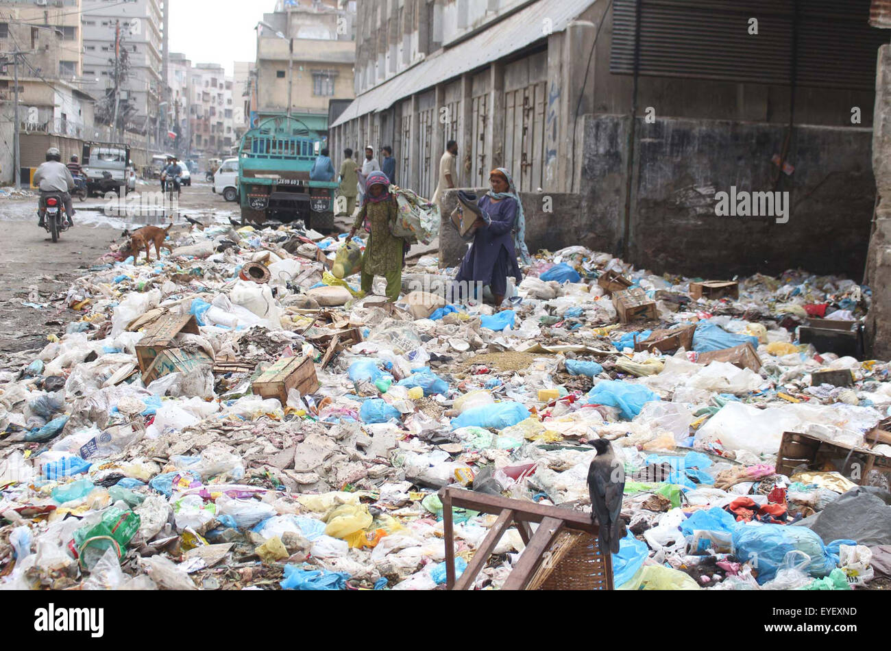 Huge heap of garbage litter down on road opposite to the back entrance ...