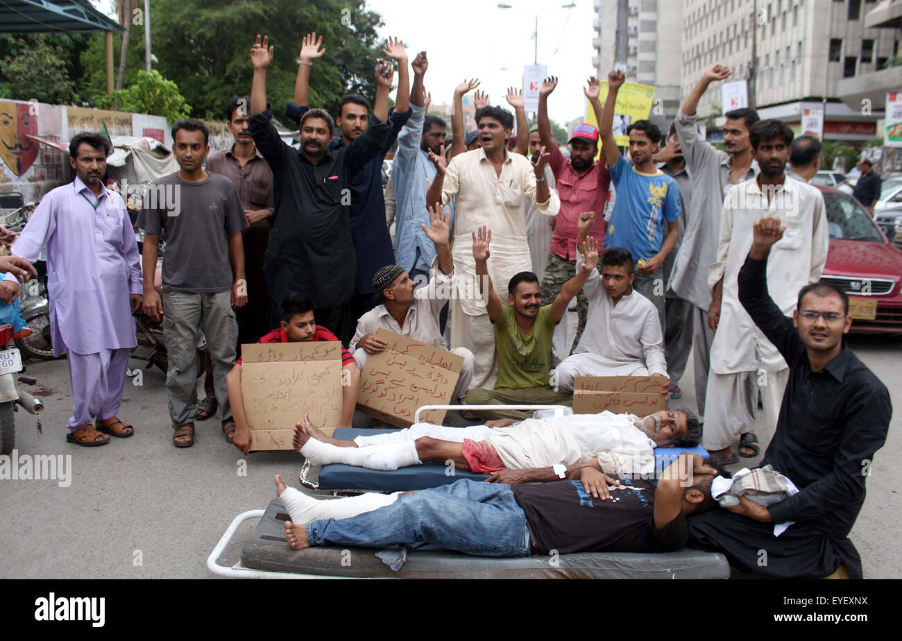Traders of Lyari are protesting against torture of extortion mafia upon ...