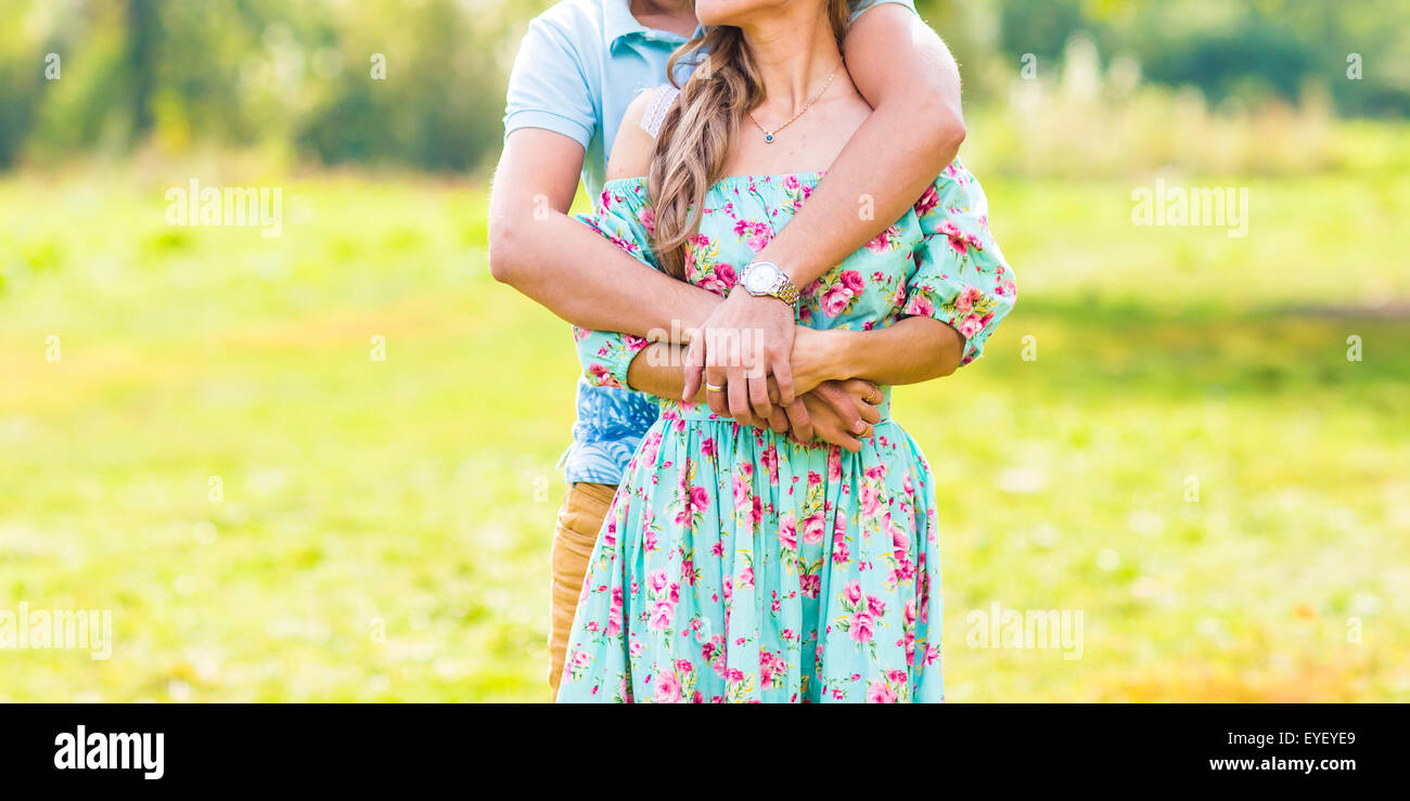 Man protecting girlfriend hi-res stock photography and images - Alamy