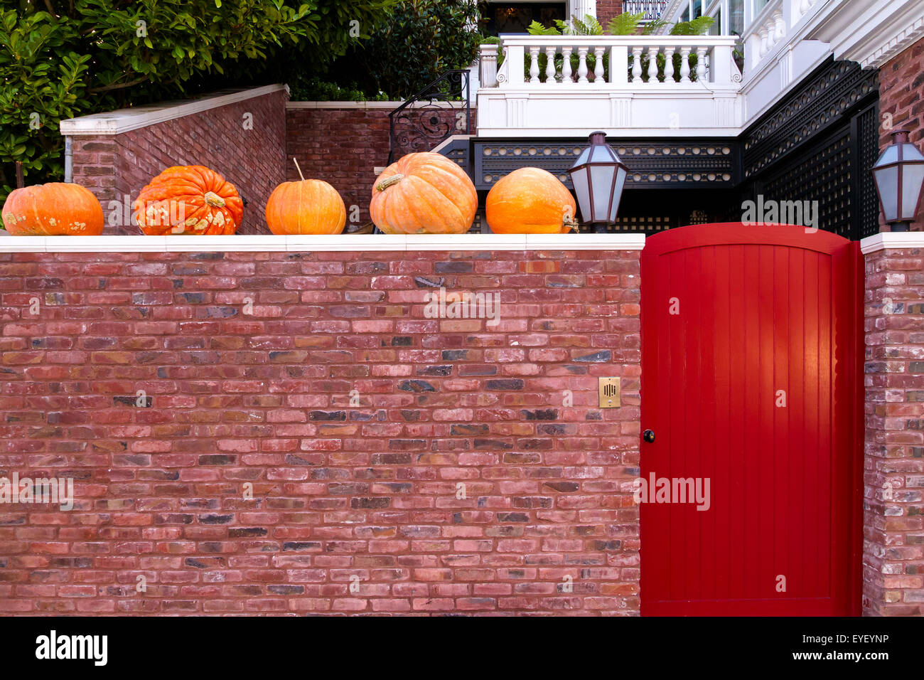 Halloween Pumpkins on top of a wall of a luxury house on Broadway in ...