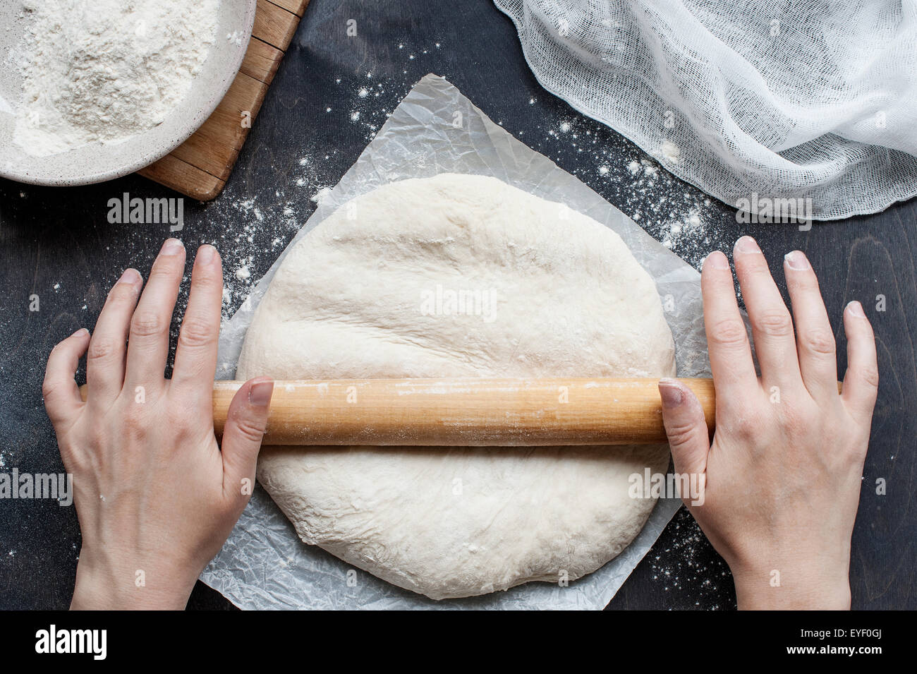 Hands rolled dough Stock Photo - Alamy
