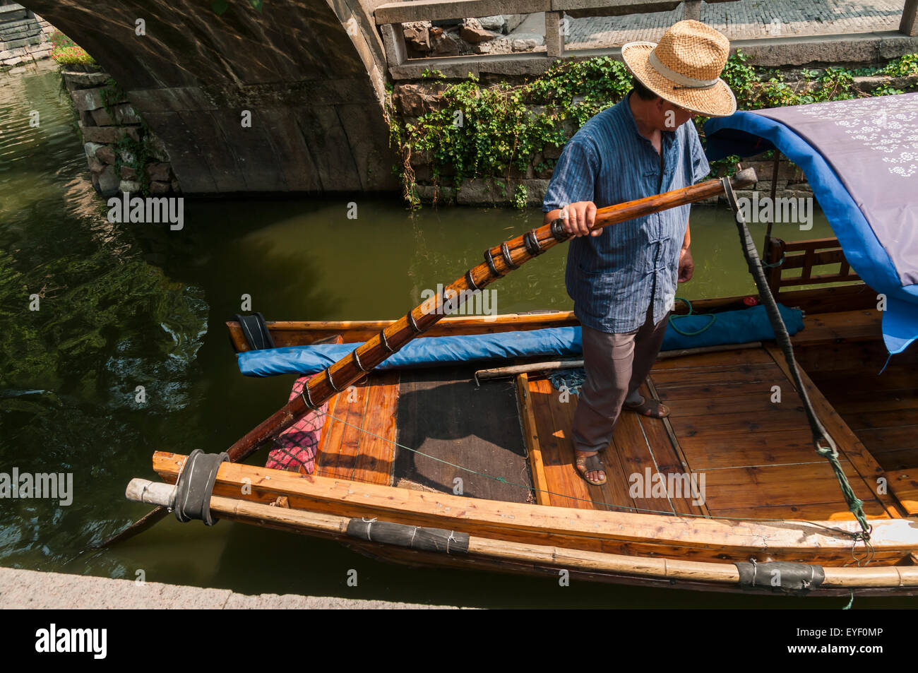 Boatmen drive their boats in water channels, as Venetia; ZhouZhuang ...