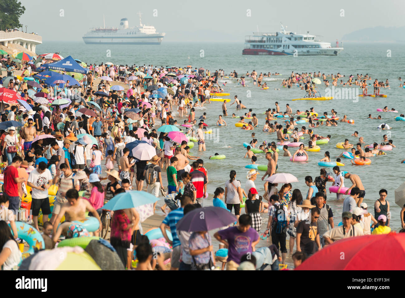 Busy seaside with boats in the Taiwan Strait; Xiamen, Fujian, China ...