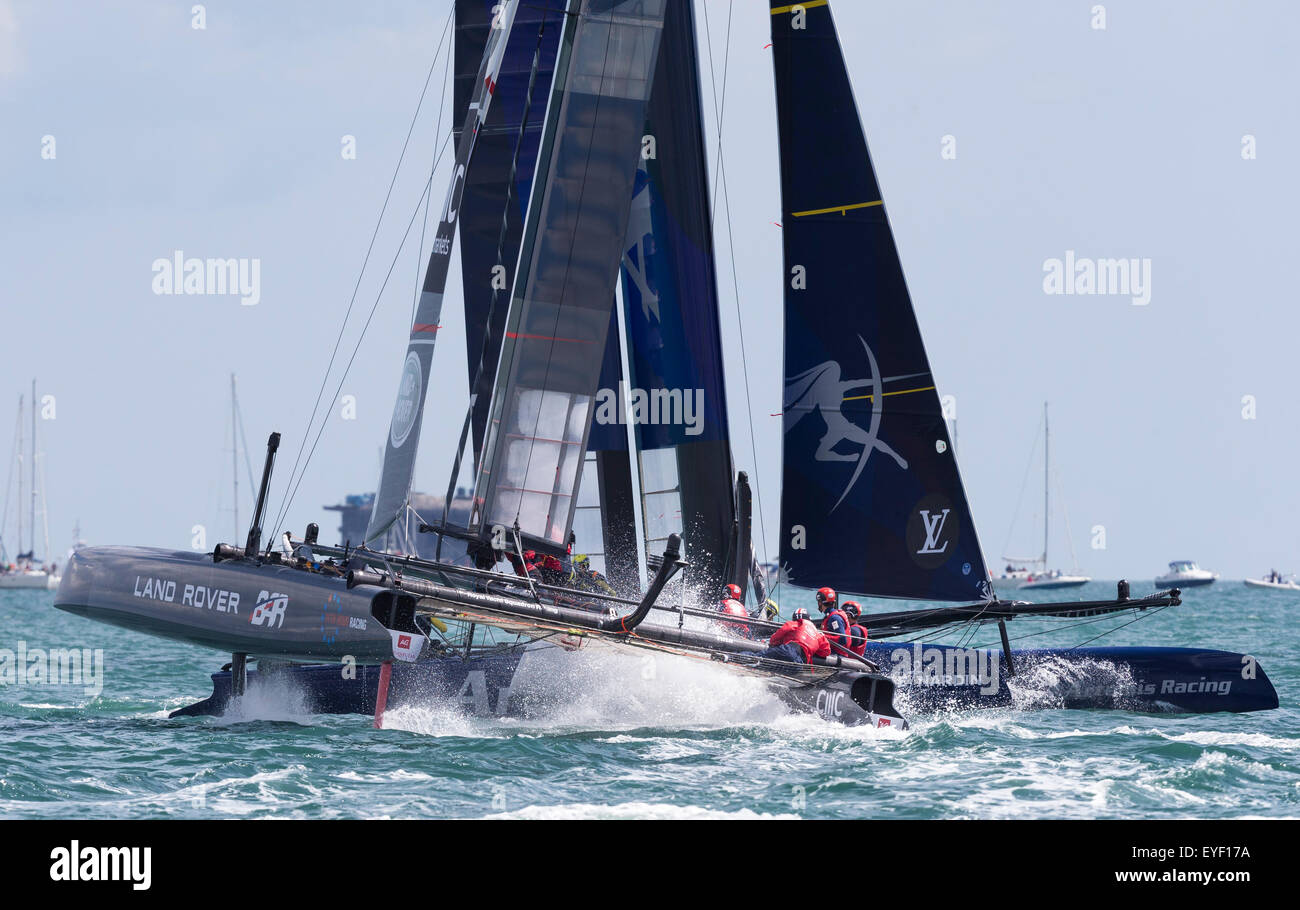 Sir Ben Ainslie racing his AC45 foiling catamaran on the Solent off ...