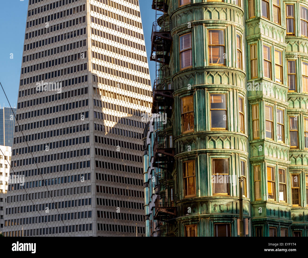 The Transamerica Pyramid and Copper Green of Columbus Tower or Sentinel ...
