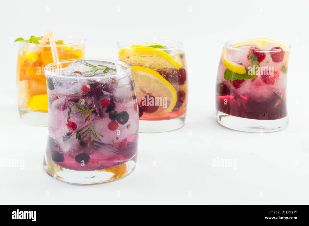 Natural fruit iced-T juice with ice, lemon and sliced fruits in a ...