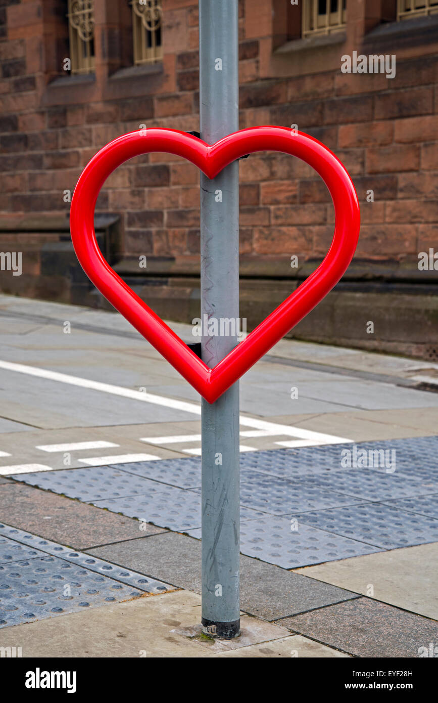 A red heart on a post Stock Photo - Alamy