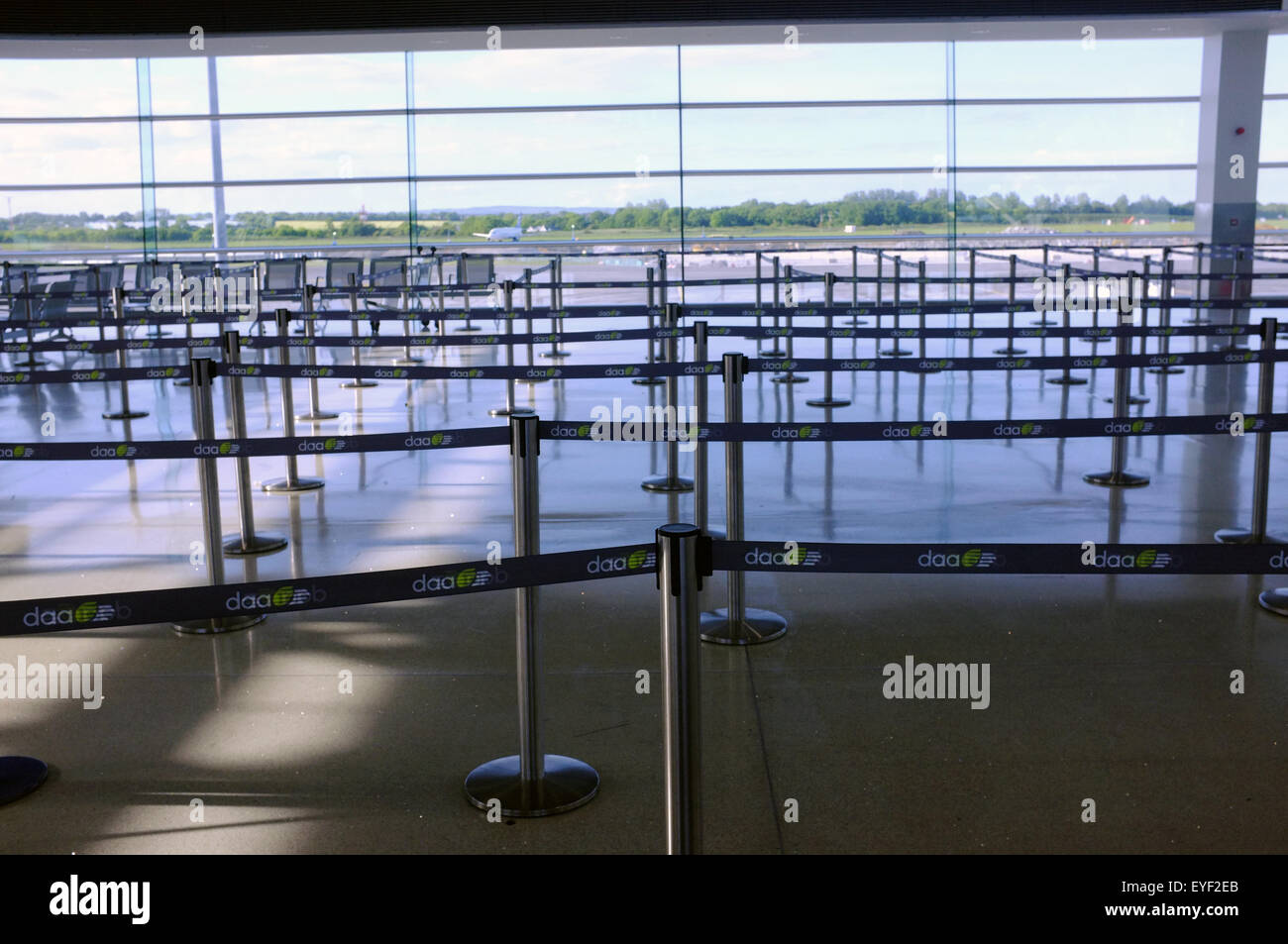 Temporary rope lanes created by stanchions in Dublin Airport directing ...