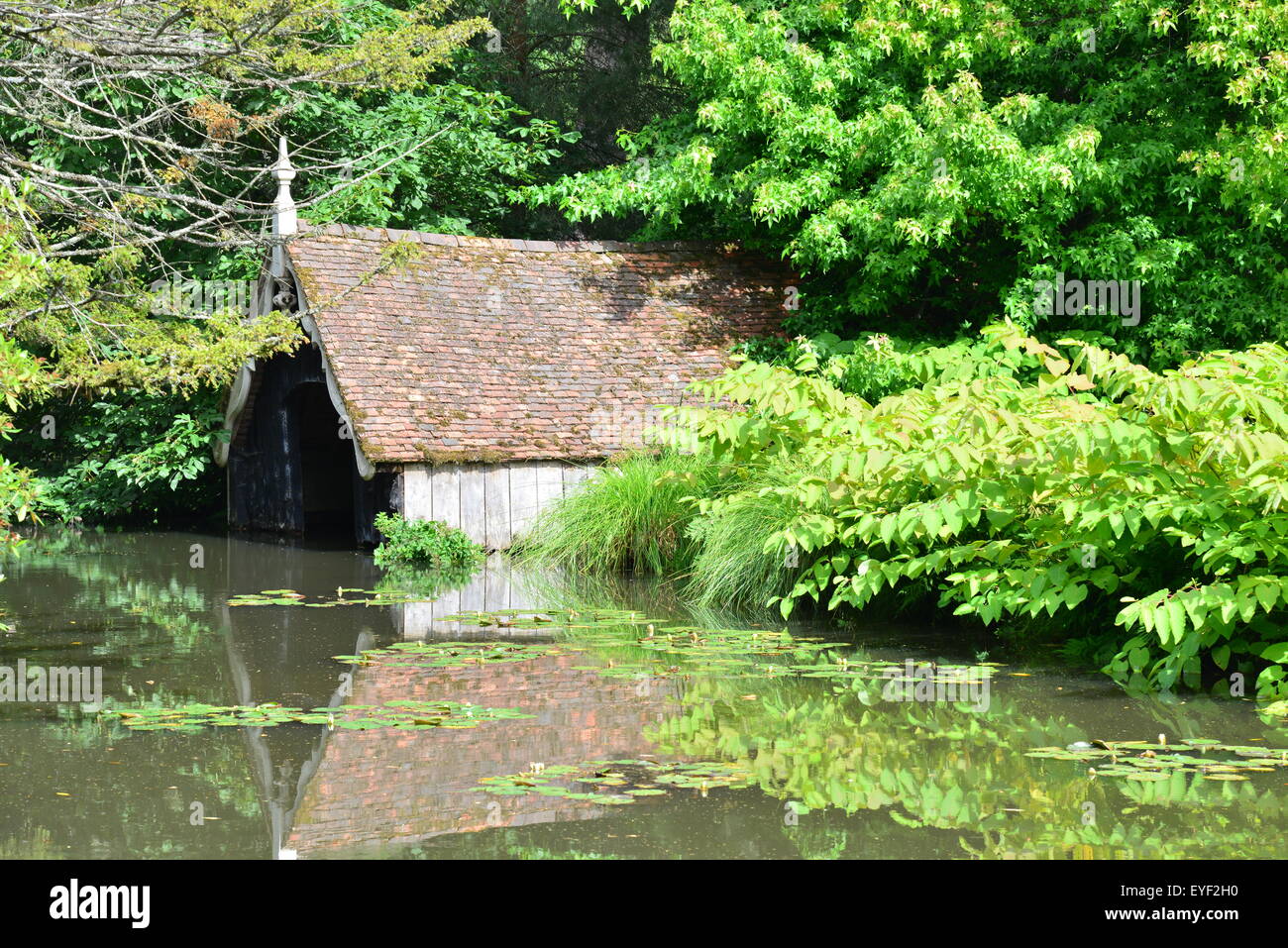An old Victorian boat house at a moat in England Stock Photo - Alamy