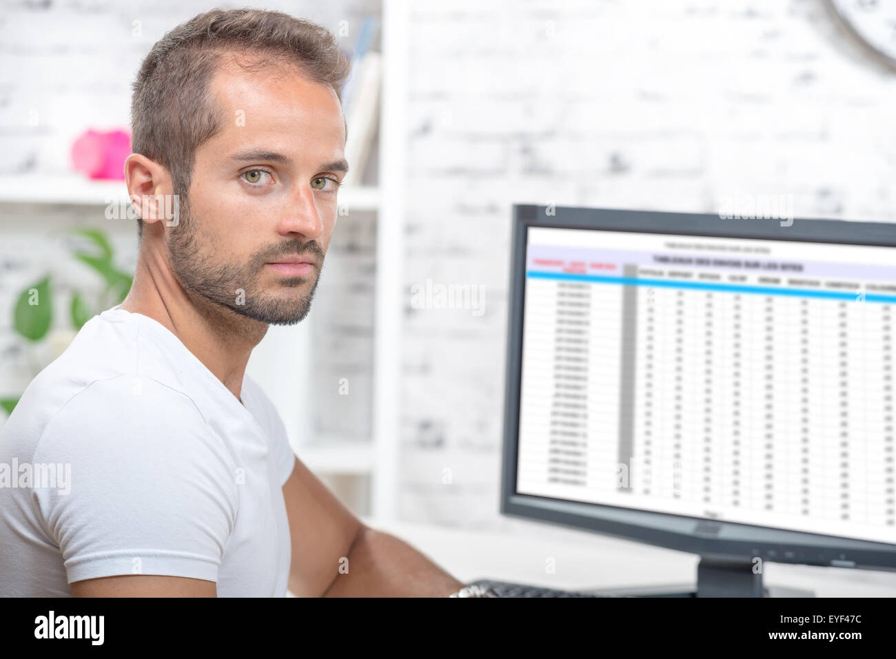 young executive working with his computer in his office Stock Photo - Alamy