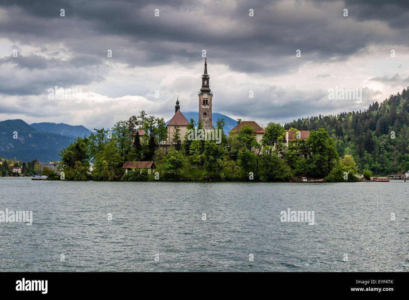 Panoramic view of Bled on cliff with high Alps on background, scenery ...