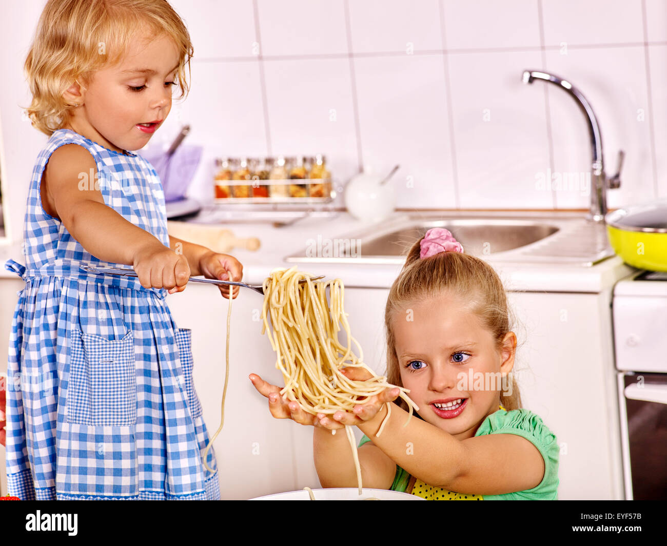 Children cooking at kitchen Stock Photo - Alamy