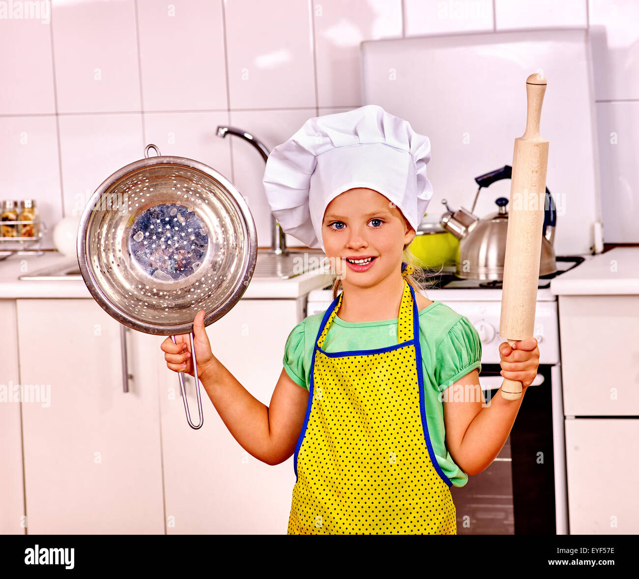 Child cooking at kitchen Stock Photo - Alamy