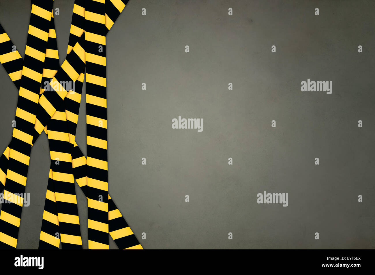 Yellow and black striped caution bands, on grey background Stock Photo ...