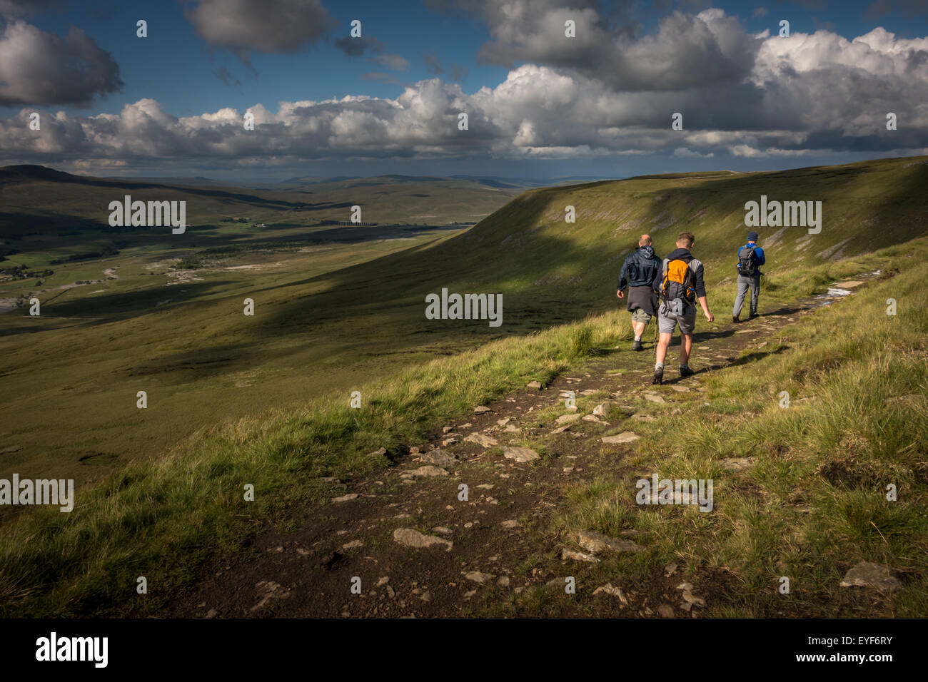 Walkers heading from Ingleborough towards Ribblehead along the high ...