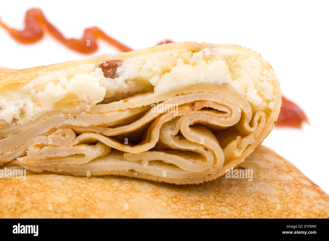 Stuffed pancakes on white close up Stock Photo - Alamy