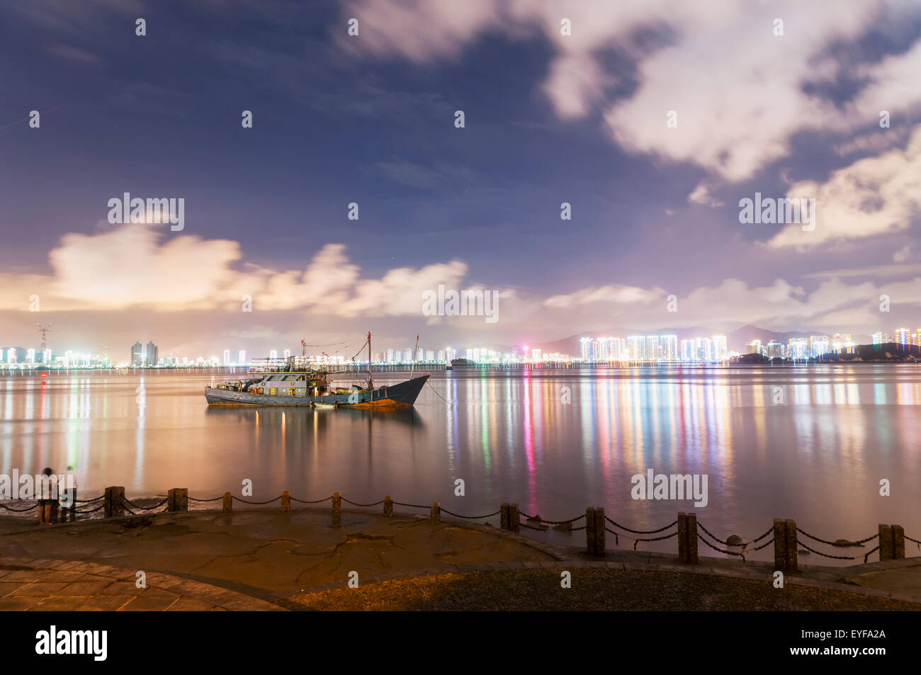 Landscape from Xiamen bay, an old boat stuck because the low tide in ...