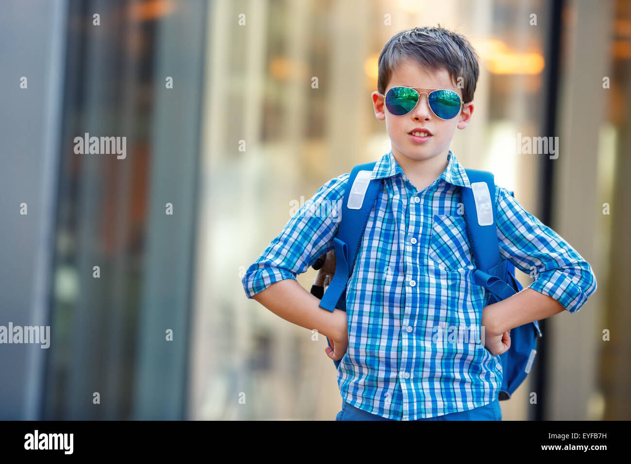 Portrait of cute school boy with backpack Stock Photo - Alamy