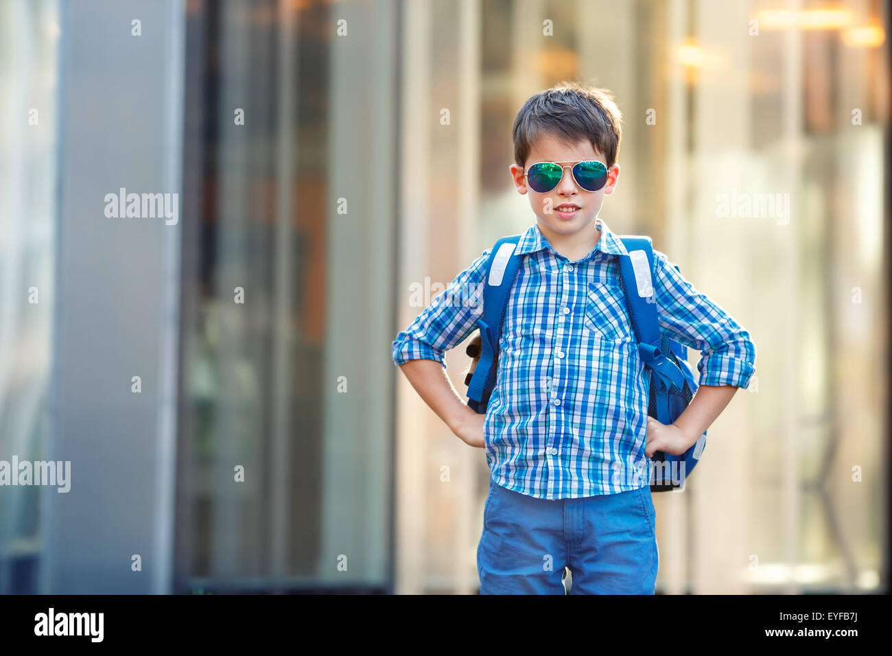 Portrait of cute school boy with backpack Stock Photo - Alamy