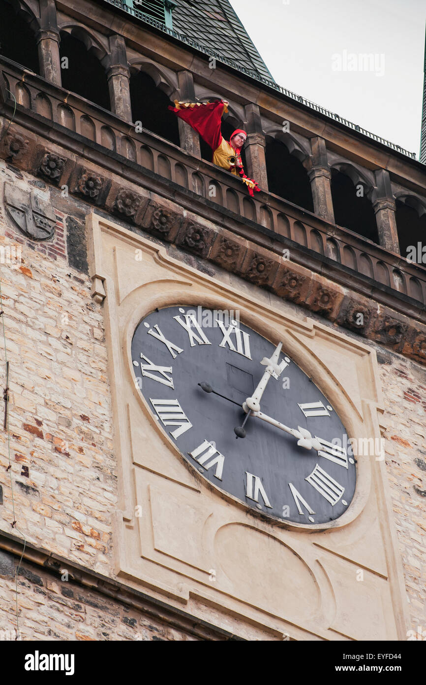Czech Republic, Trumpet player waving to people from Town Hall tower ...