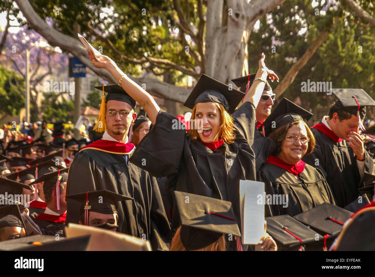Happy community college graduates celebrate commencement ceremonies in ...
