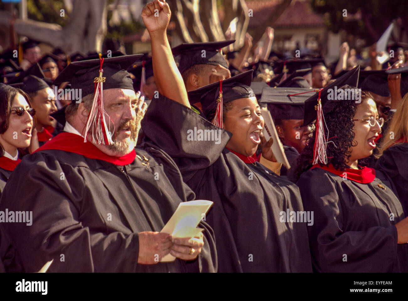 Happy community college graduates celebrate commencement ceremonies in ...