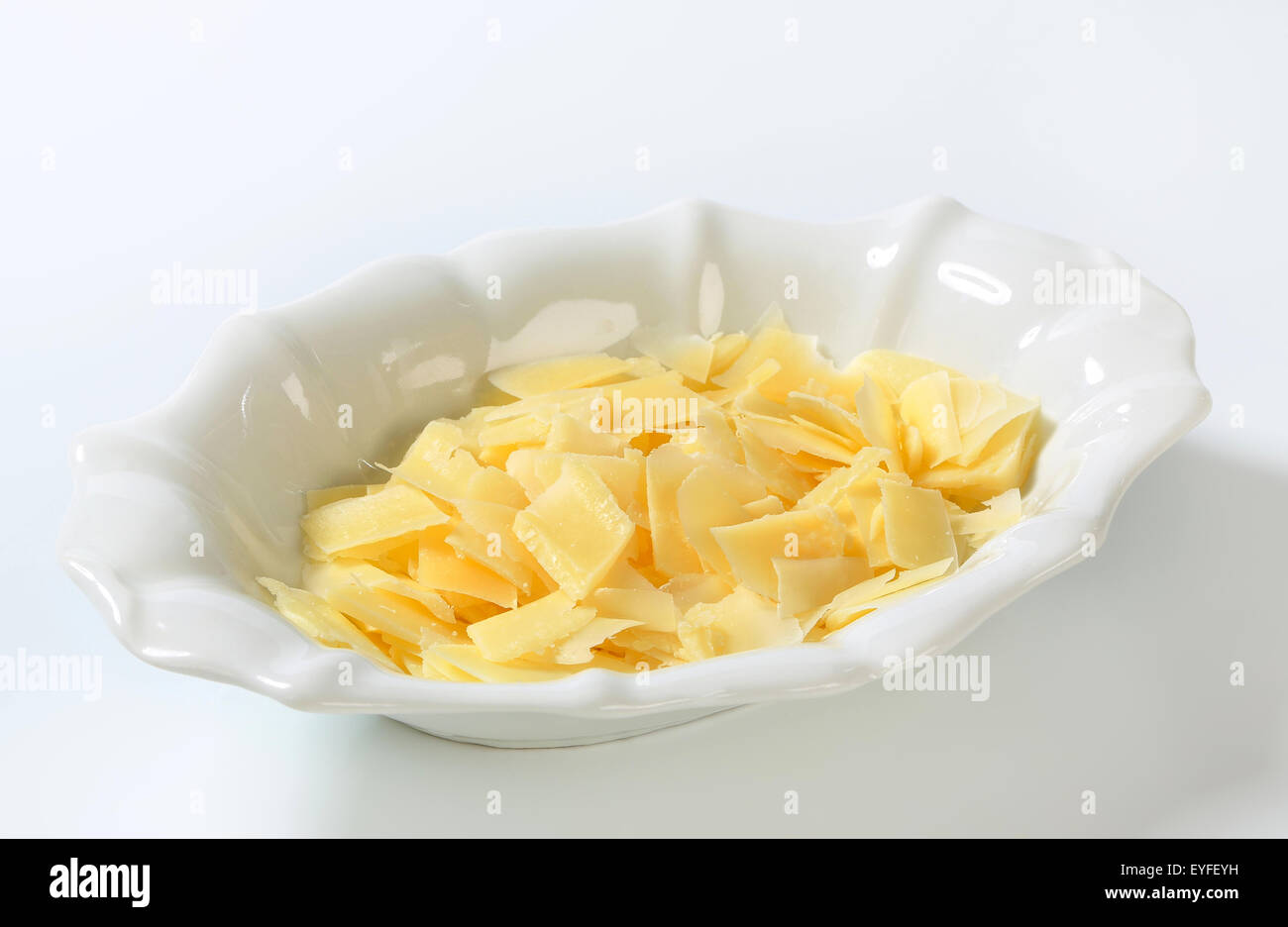 Grated Parmesan cheese in a bowl Stock Photo - Alamy