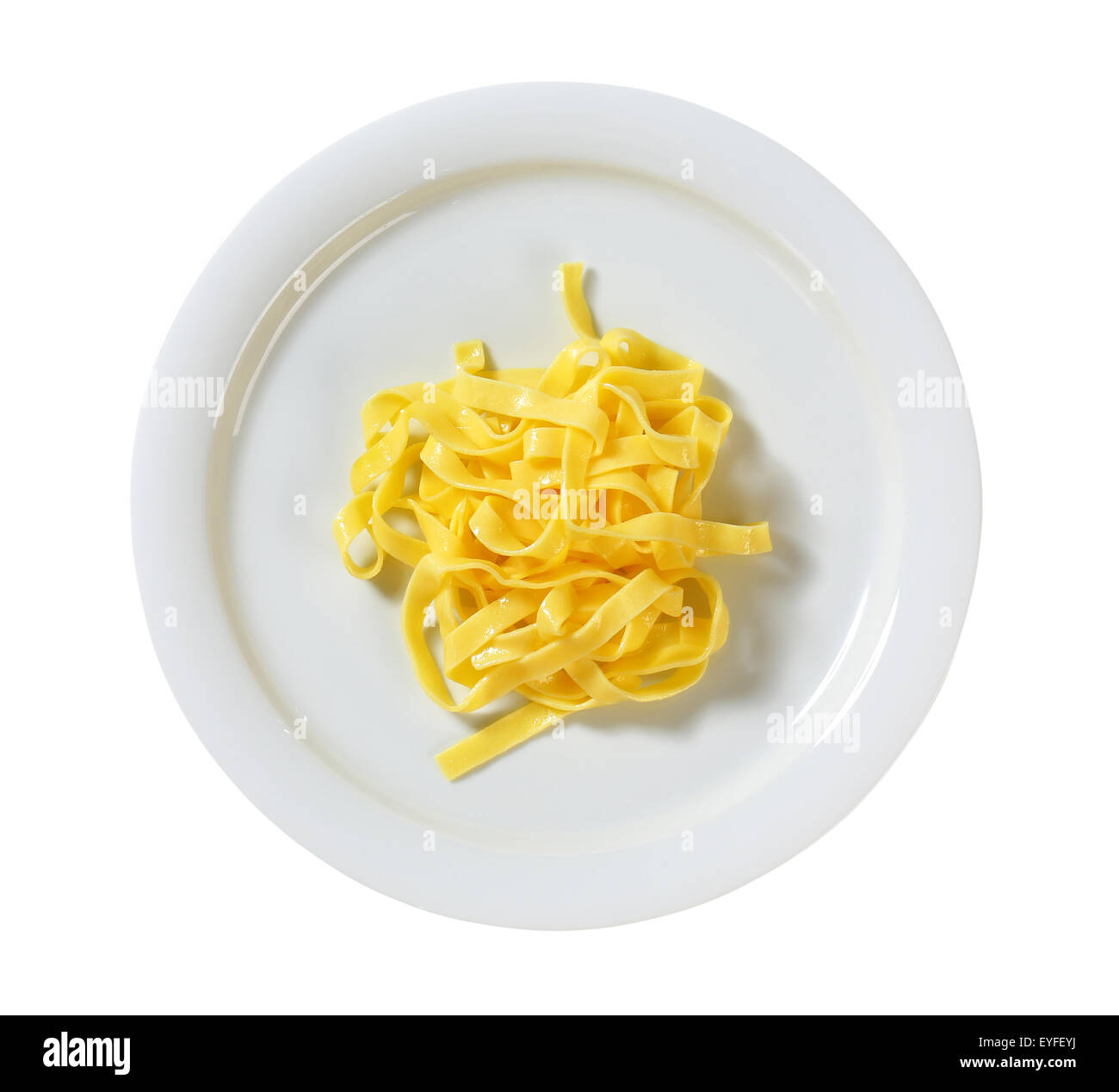 Cooked ribbon pasta on plate Stock Photo - Alamy