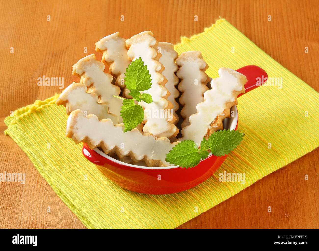 Vanilla cookies with white icing Stock Photo - Alamy