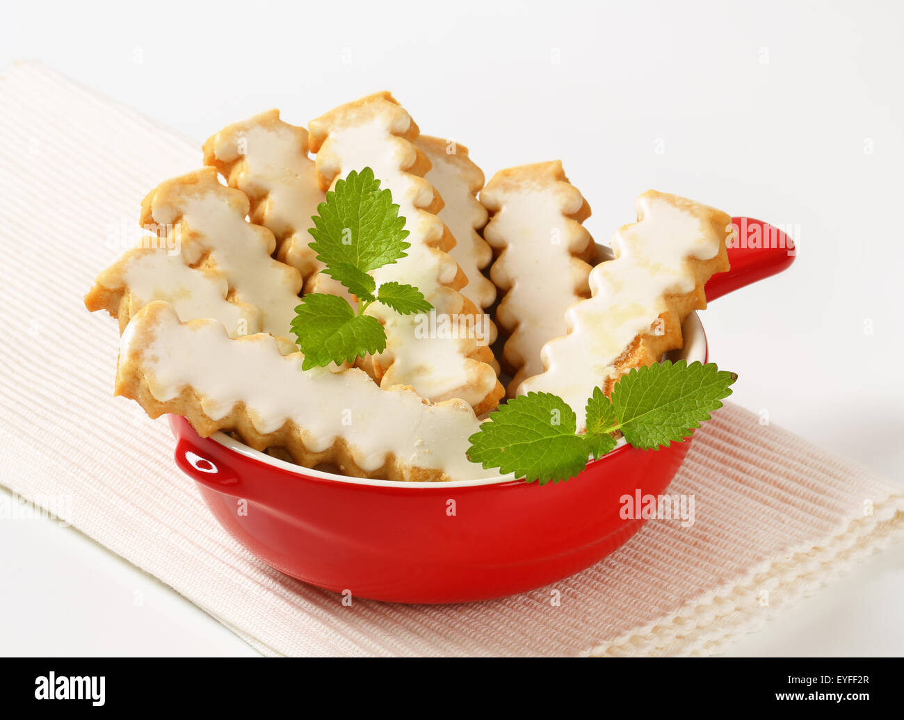 Vanilla cookies with white icing Stock Photo - Alamy