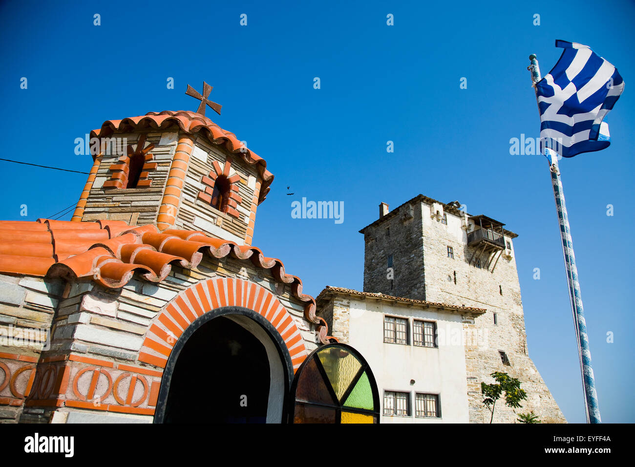 Greece, Halkidiki, Orthodox Greek church next to the Byzantine Tower or ...
