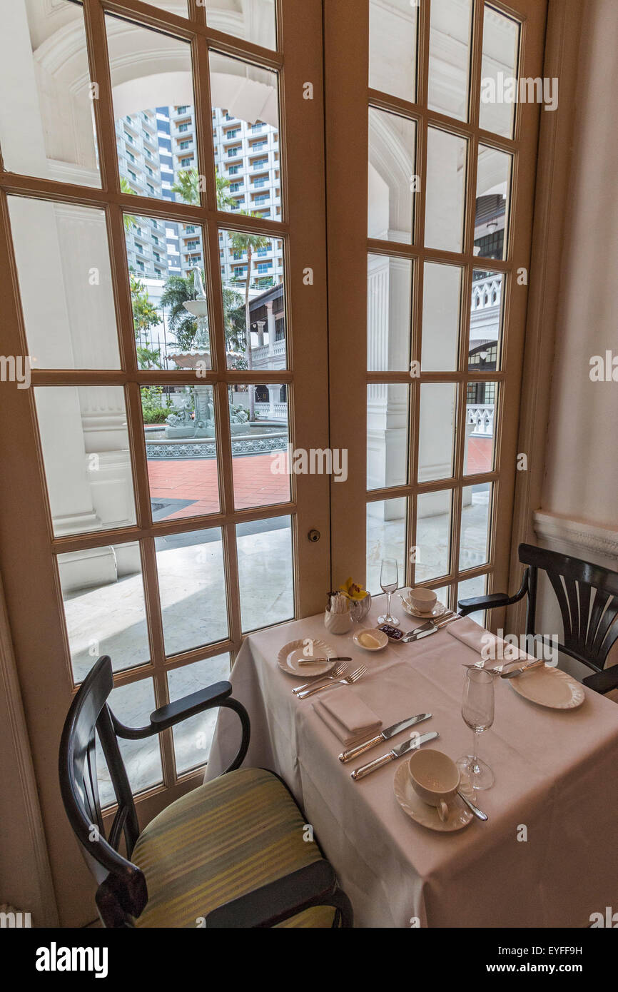 High tea at Raffles Hotel, which was built in 1887 and has become ...