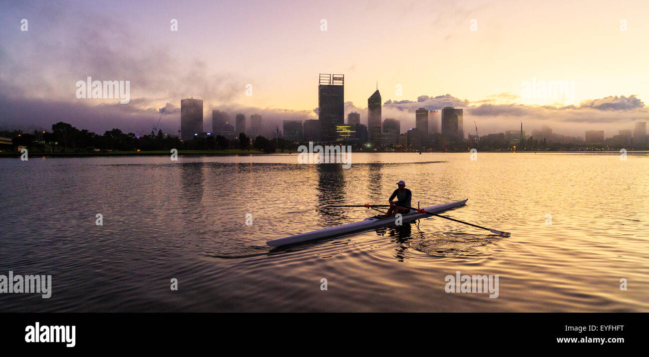 A man in a K1 racing kayak on the Swan River at sunrise Stock Photo - Alamy