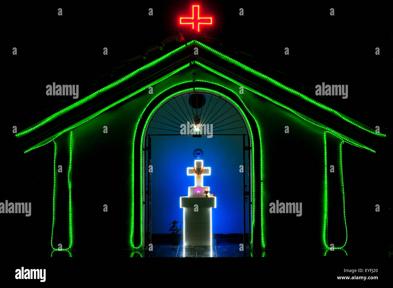 Colourfully lit chapel at night; Goa, India Stock Photo - Alamy