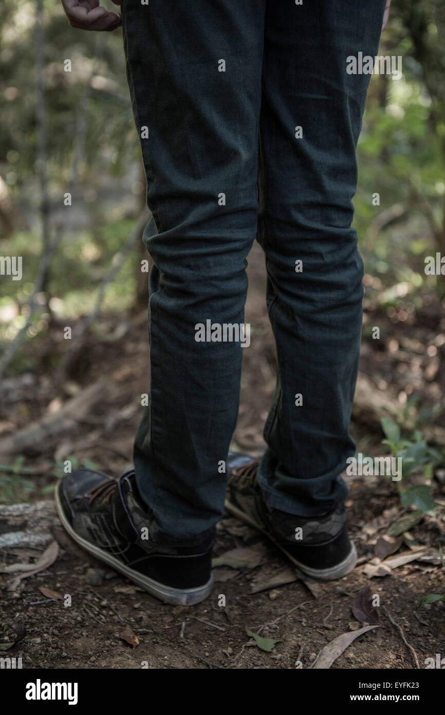 Homeless boy in the park Stock Photo - Alamy