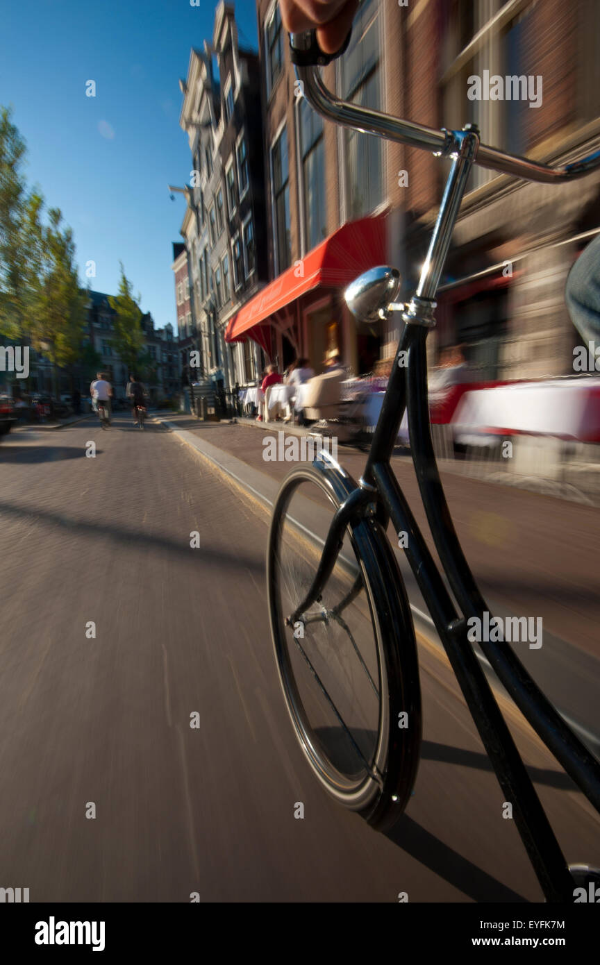 Cycling down cycle path; Amsterdam, Holland Stock Photo - Alamy