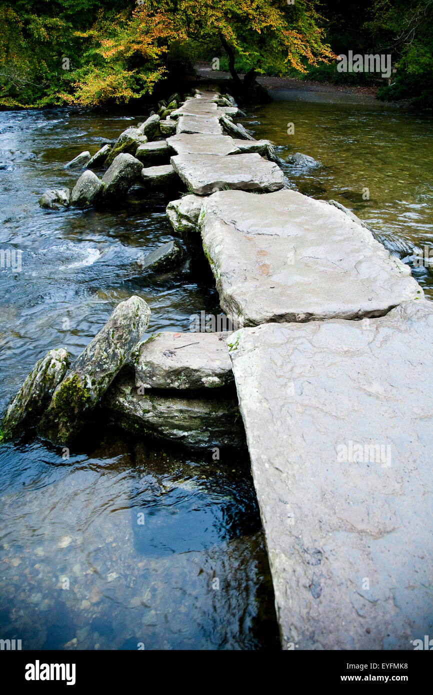 The Tarr Steps, a prehistoric clapper bridge across the River Barle ...