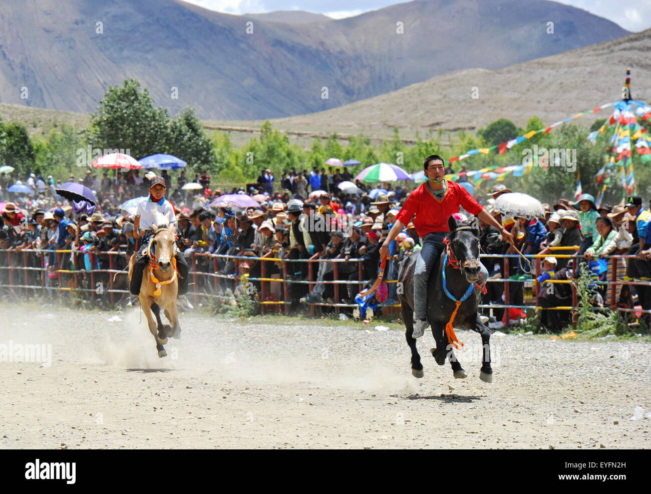 Jiangzi, China's Tibet Autonomous Region. 28th July, 2015. People race ...