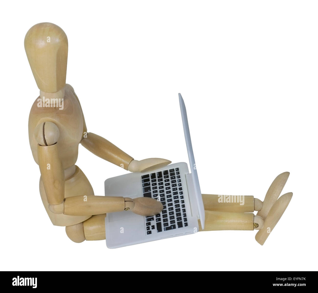 Sitting on the Floor working on a Laptop used for data management ...