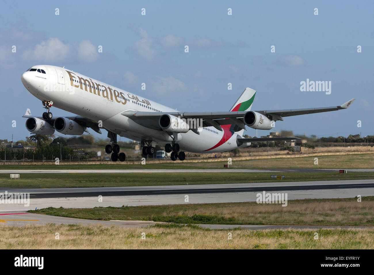 Emirates Airbus A340 take off Stock Photo - Alamy